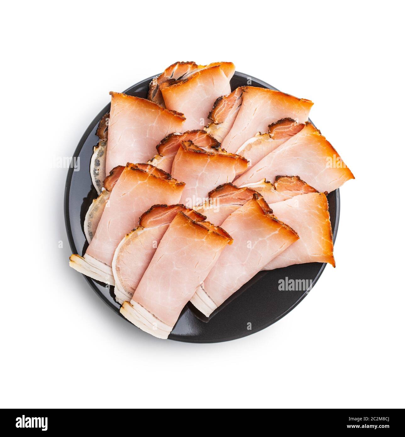 Sliced smoked ham on plate. Tasty pork meat isolated on white ...