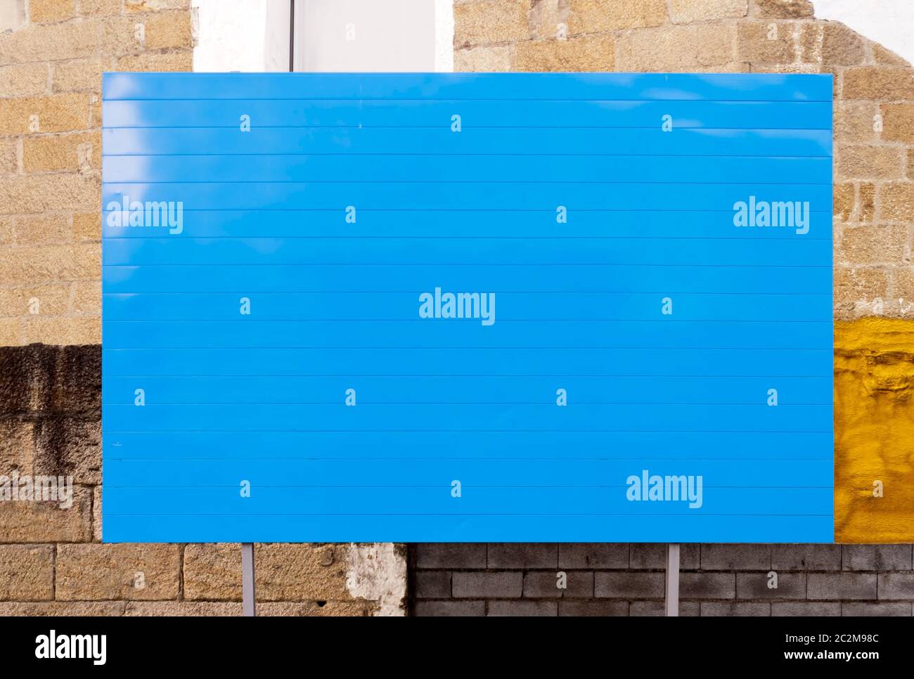 Blank blue advertising sign in the street. Empty billboard background ...