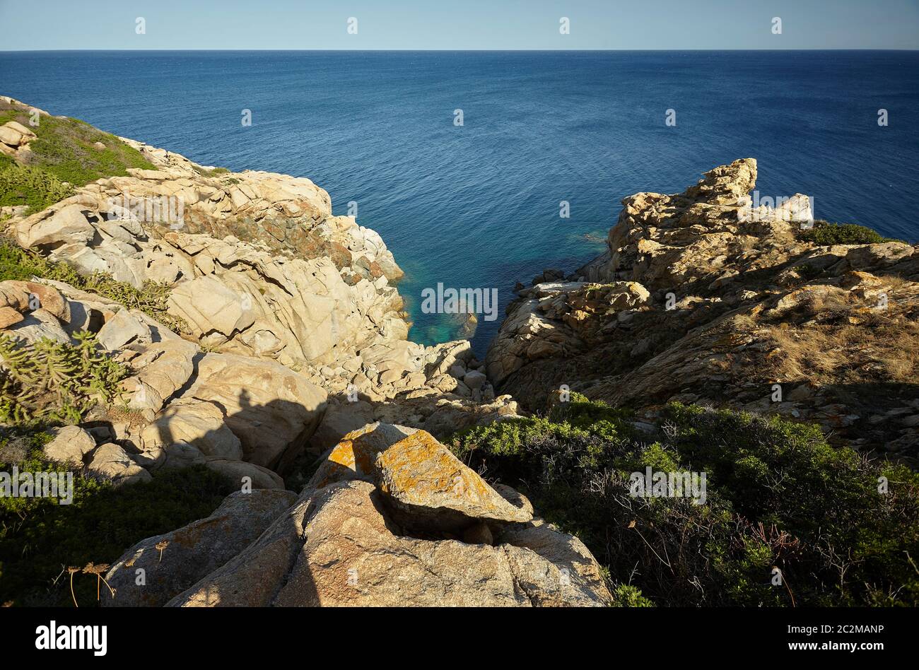 Coastline of Capo Ferrato with a precipice overlooking the sea formed ...