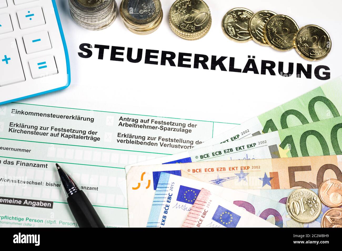 tax papers with money pencil and form Stock Photo - Alamy