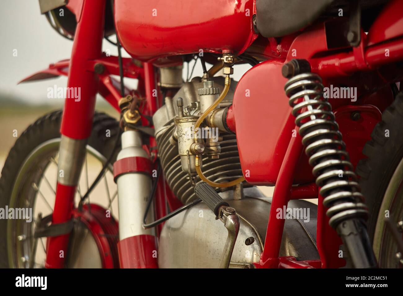 Engine of a very old vintage motorcycle with visible details of the ...