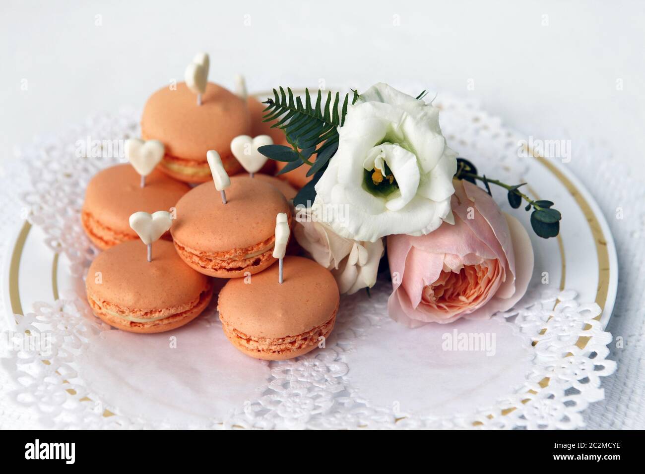 Cakes and boutonniere with roses Stock Photo - Alamy