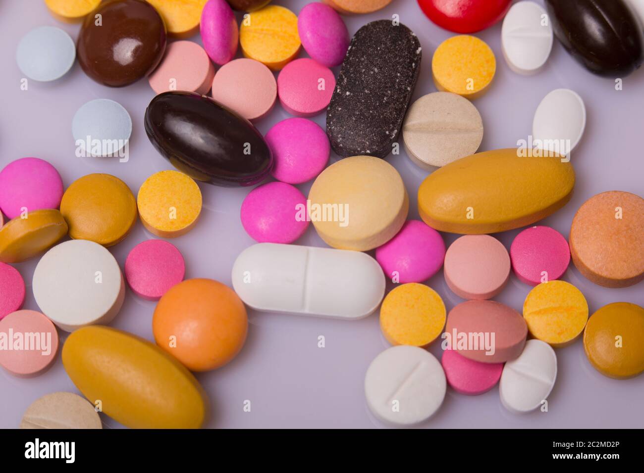 different Tablets pills capsule heap mix therapy drugs Stock Photo - Alamy