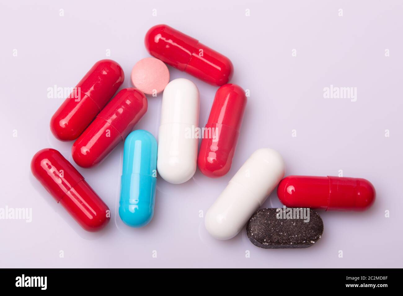 different Tablets pills capsule heap mix therapy drugs Stock Photo - Alamy