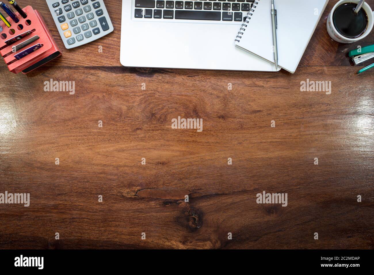 Laptop on Vintage Wooden desktop in modern office with accessories ...