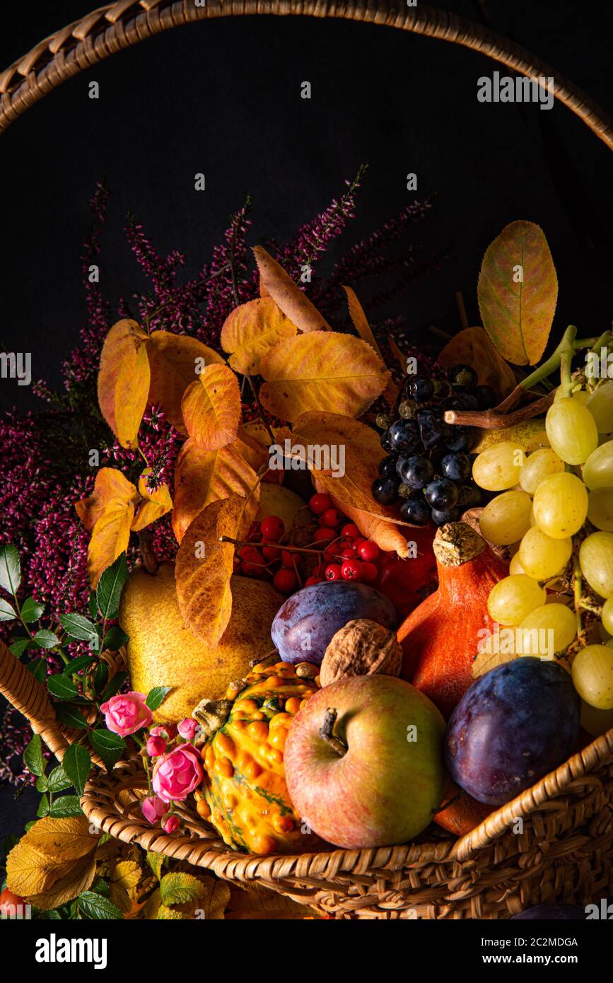 autumnal cornucopia in round basket Stock Photo - Alamy