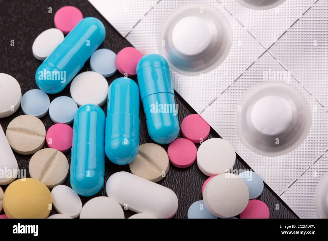 different tablets pills capsule heap mix therapy drugs Stock Photo - Alamy