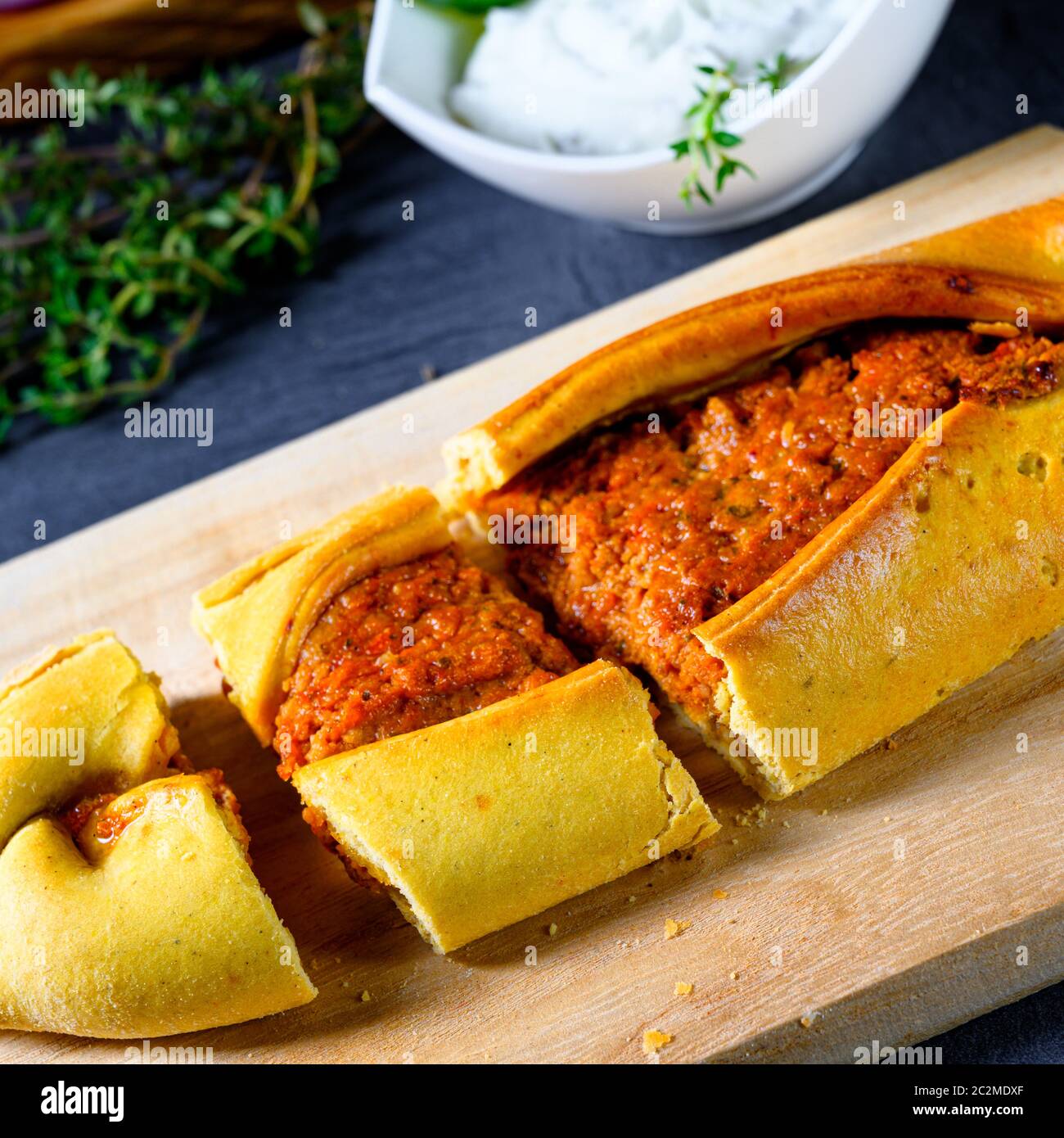 Pide with minced meat, spinach feta and sheep's cheese Stock Photo - Alamy
