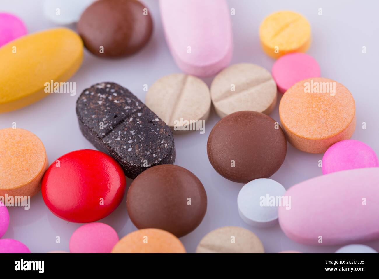 different Tablets pills capsule heap mix therapy drugs Stock Photo - Alamy