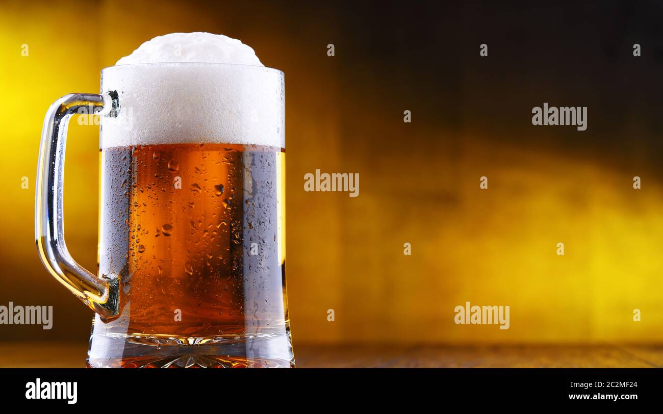 Composition with glass of draught beer Stock Photo - Alamy