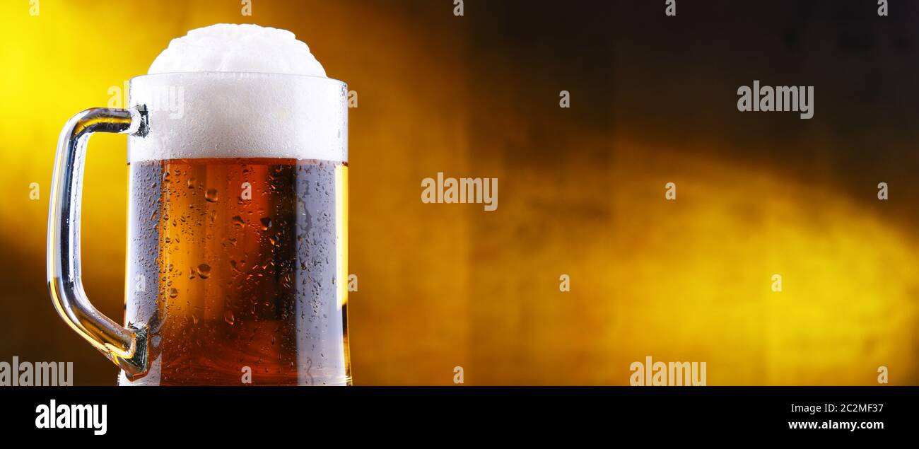 Composition with glass of draught beer Stock Photo - Alamy