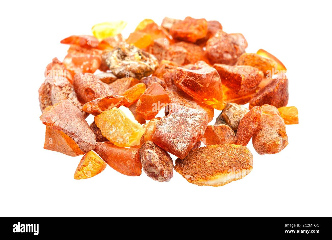 pile of raw Amber nuggets isolated on white background Stock Photo - Alamy