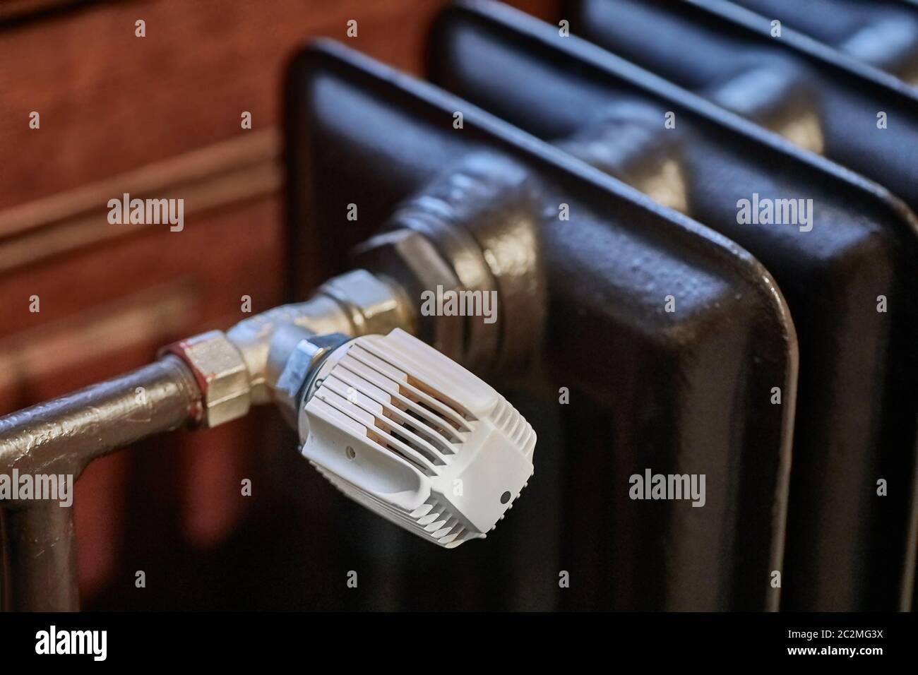 Heating radiator detail with adjusting knob Stock Photo - Alamy