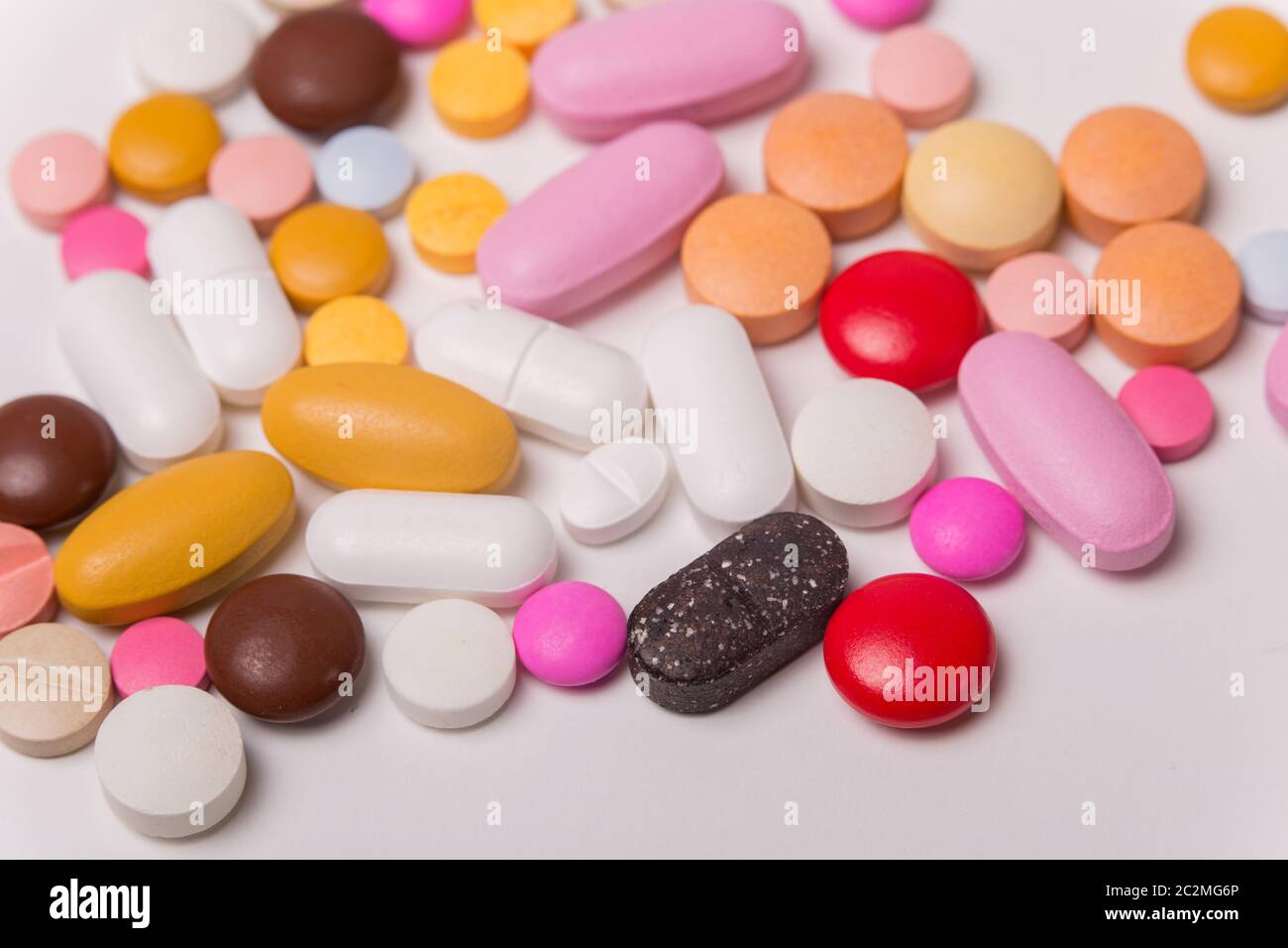 different Tablets pills capsule heap mix therapy drugs Stock Photo - Alamy