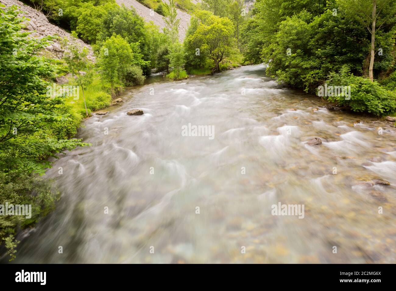 Waterfall in the Cares River located in the Picos de Europa National ...