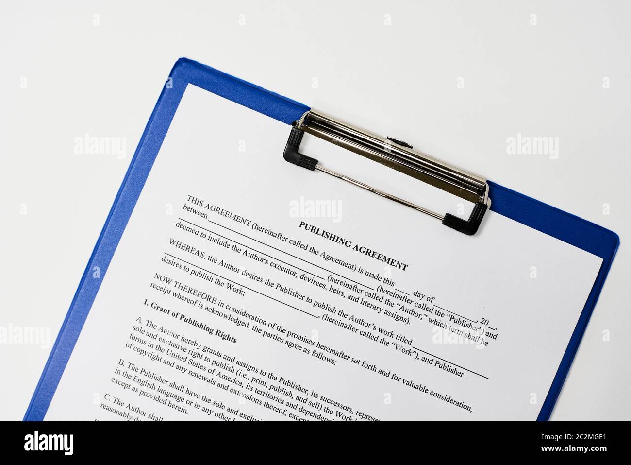 Filling and signing publishing agreement document sample Stock Photo ...