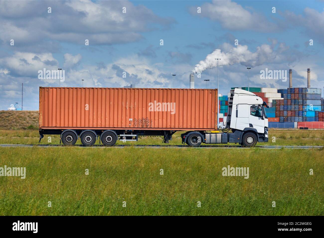 Cargo truck arriving at a container freight terminal Stock Photo - Alamy