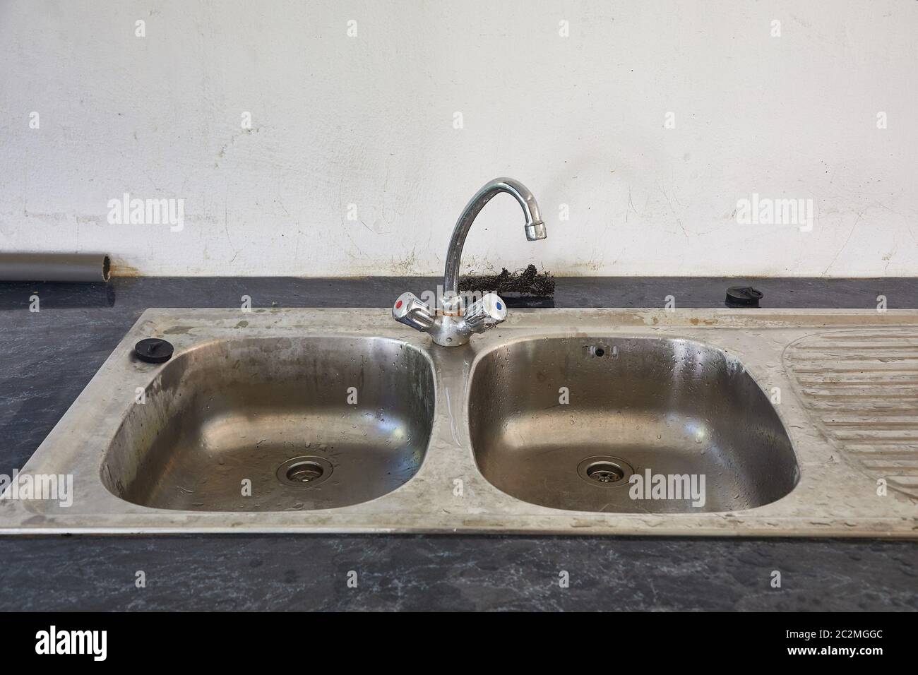 Washing basin kitchen sink in an old house Stock Photo - Alamy