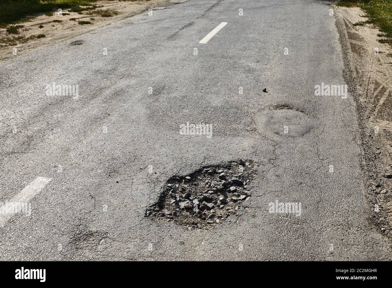 Uneven poor quality road surface hi-res stock photography and images ...