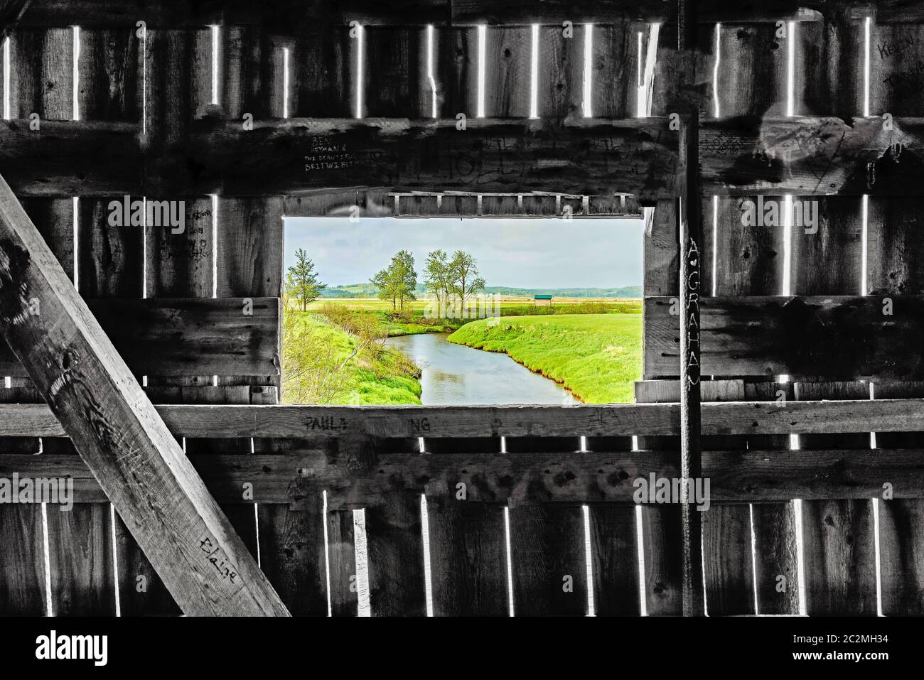Window on a covered bridge Stock Photo - Alamy