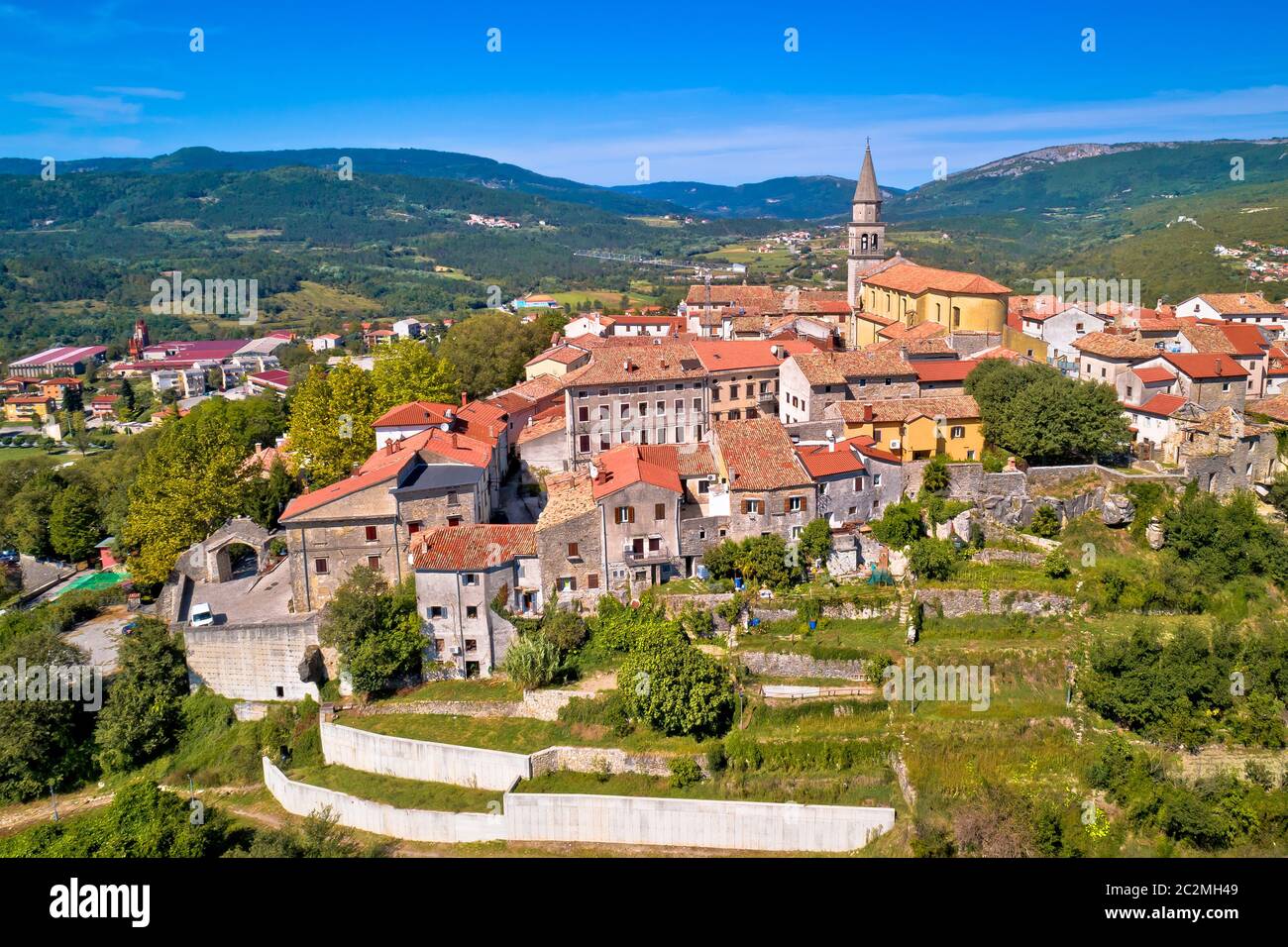 Buzet. Idyllic hill town of Buzet in green landscape aerial view ...