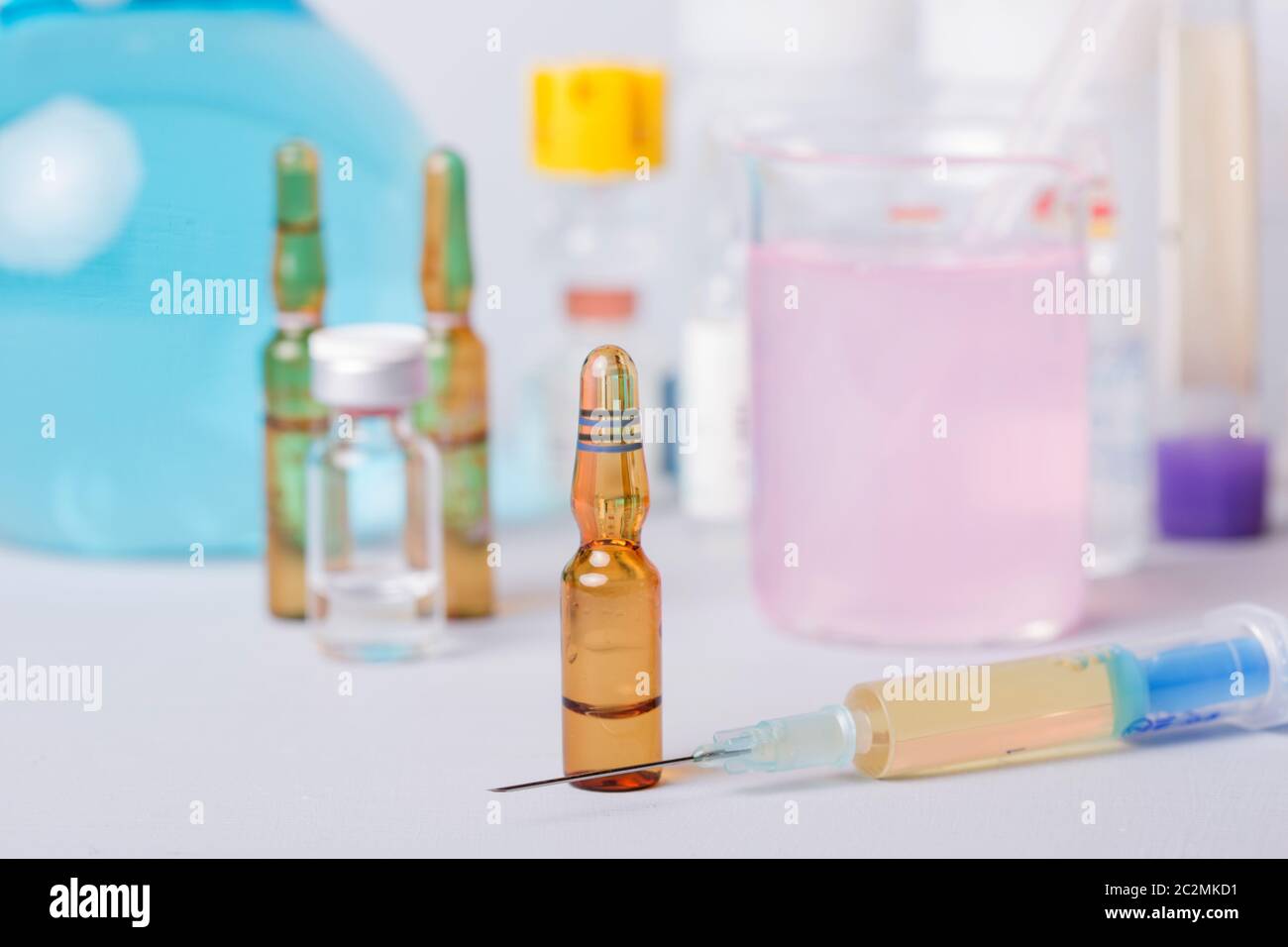 syringe with ampules of drugs Stock Photo - Alamy