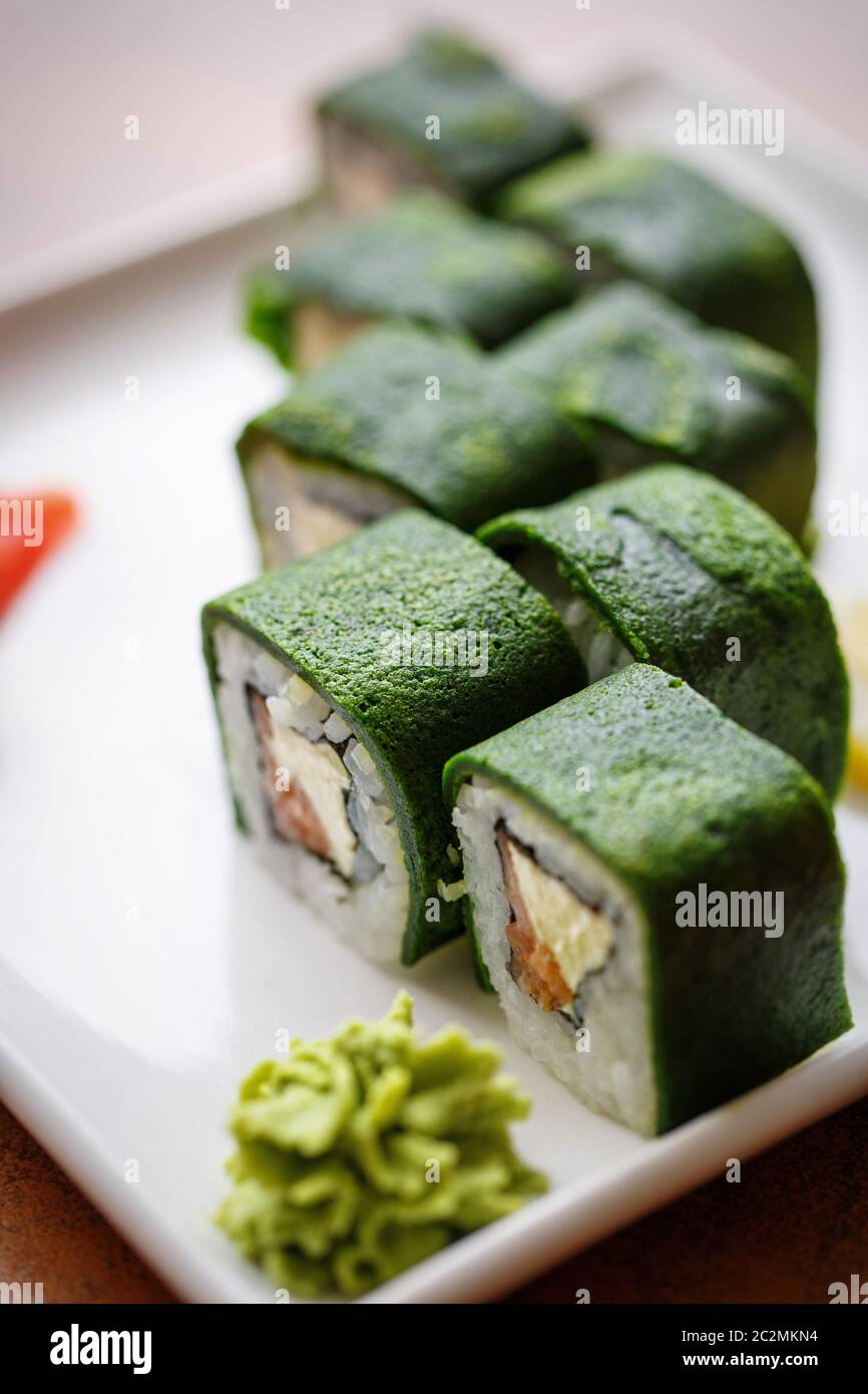 Japanese and Asian food. Green sushi are ready to serve. Concept for a ...