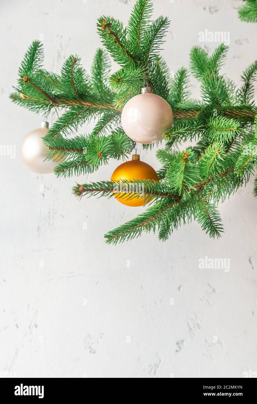 Christmas tree branch with decoration Stock Photo - Alamy