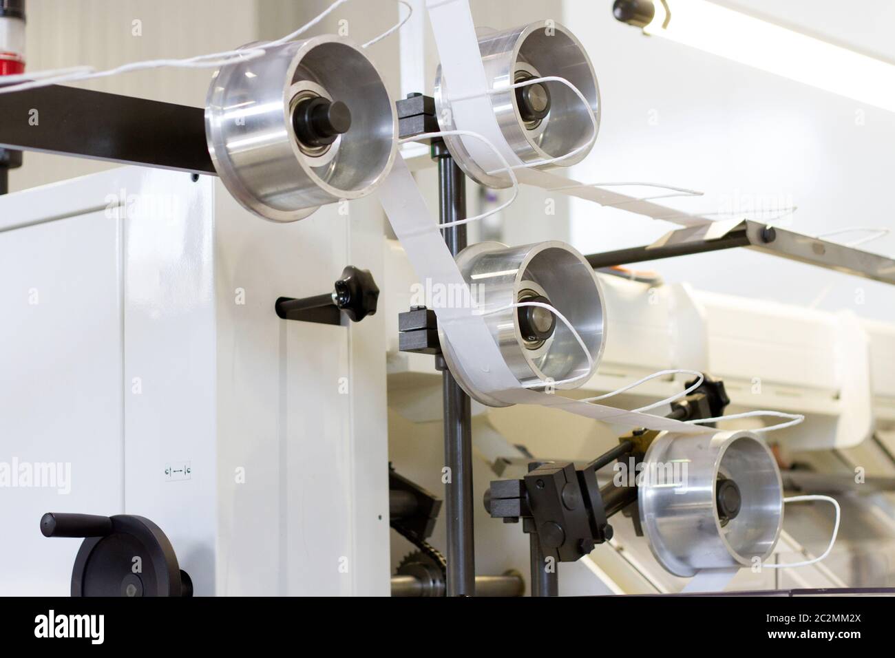 automated paper making process at the factory automated line, close up ...