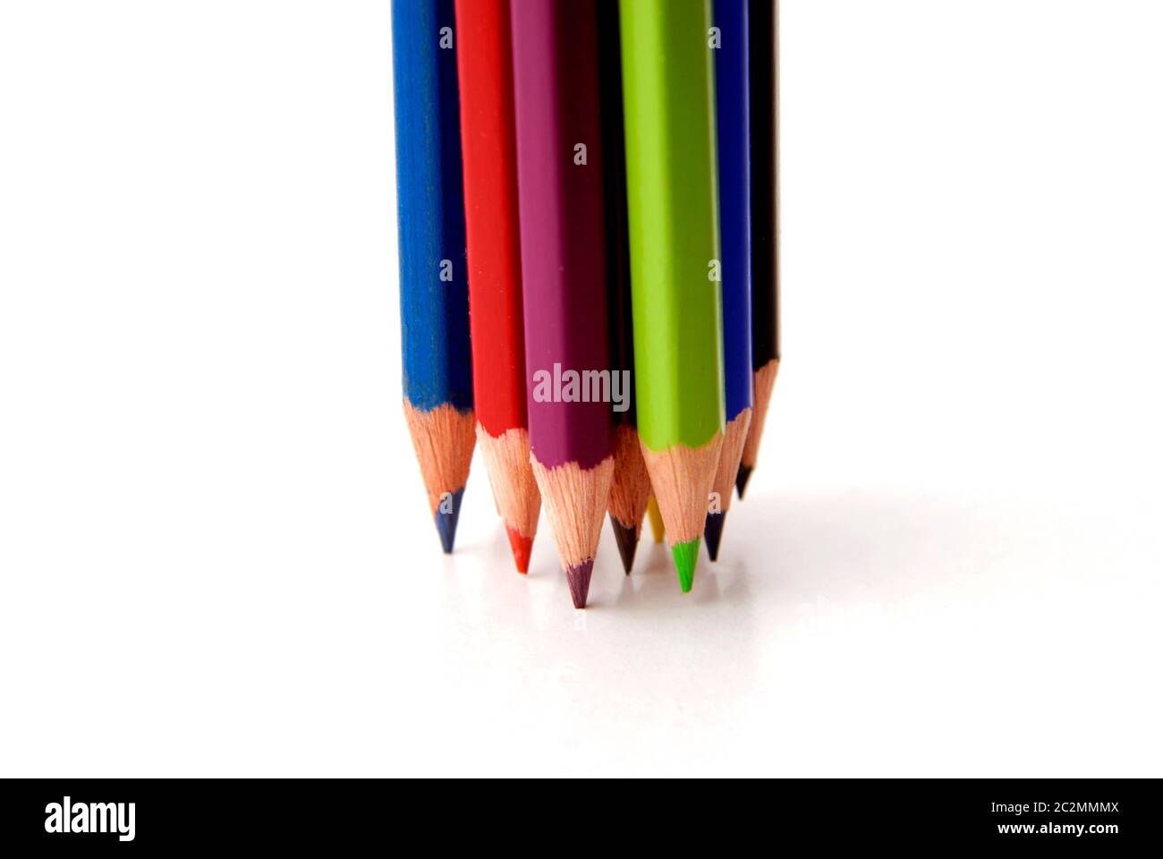 color pencils aligned and isolated on white Stock Photo - Alamy
