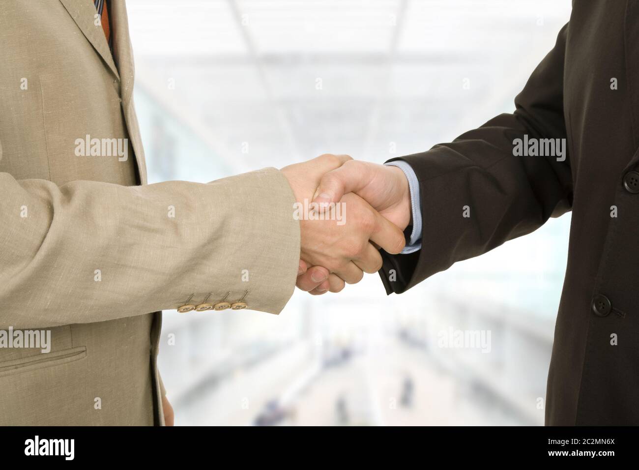 Business men hand shake at the office Stock Photo - Alamy