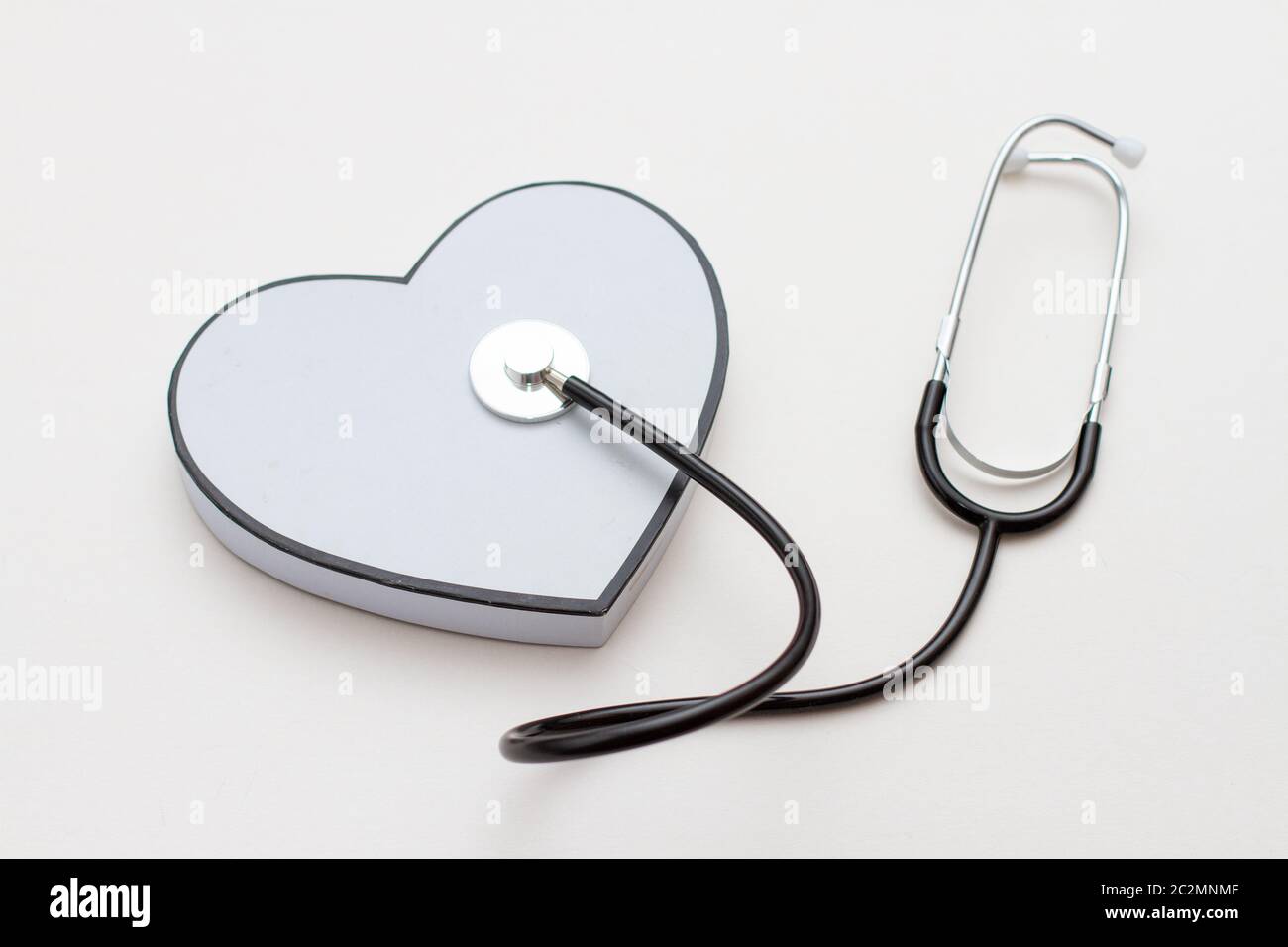 Big heart with medical diagnostic stethoscope Stock Photo - Alamy