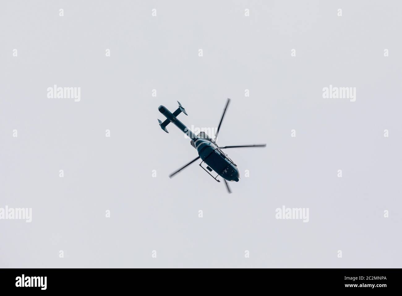 Modern Helicopter Aircraft Flying High in Sky Stock Photo - Alamy