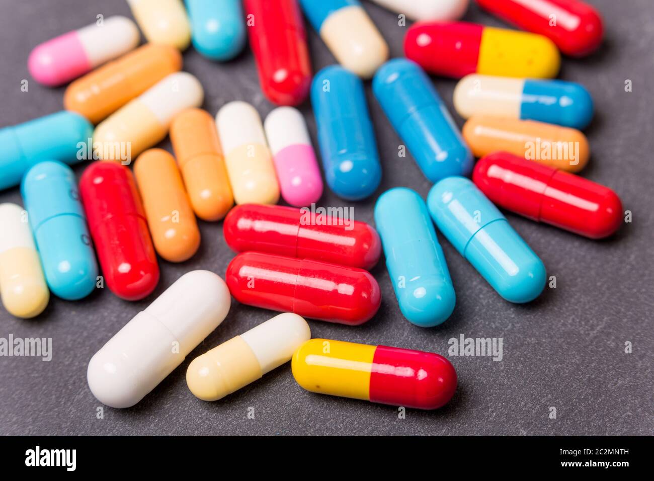 different Tablets pills capsule heap mix therapy drugs Stock Photo - Alamy