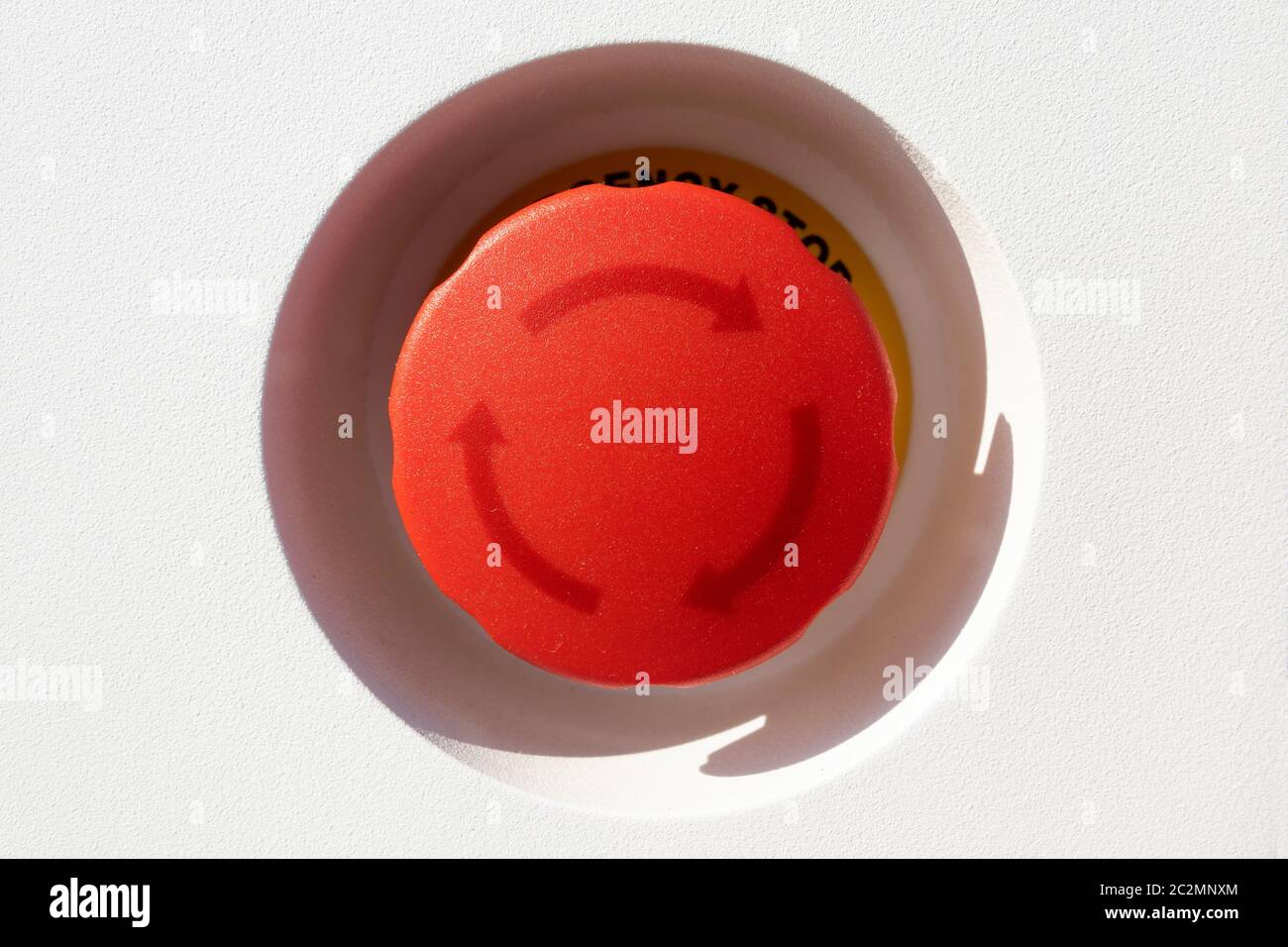 Red turning on Button in detail with arrows Stock Photo - Alamy