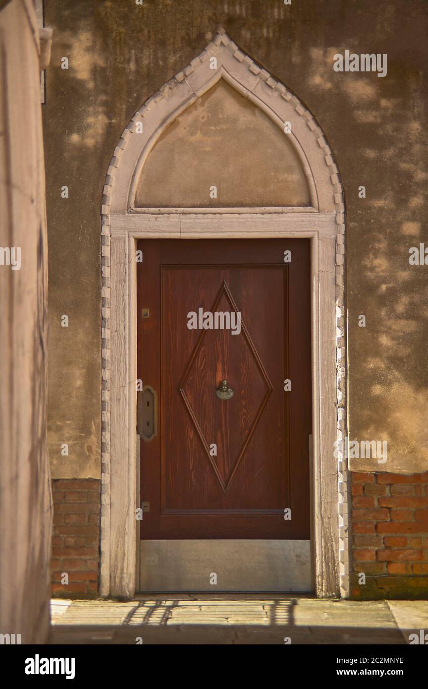 Ancient wooden door with a characteristic design belonging to a ...