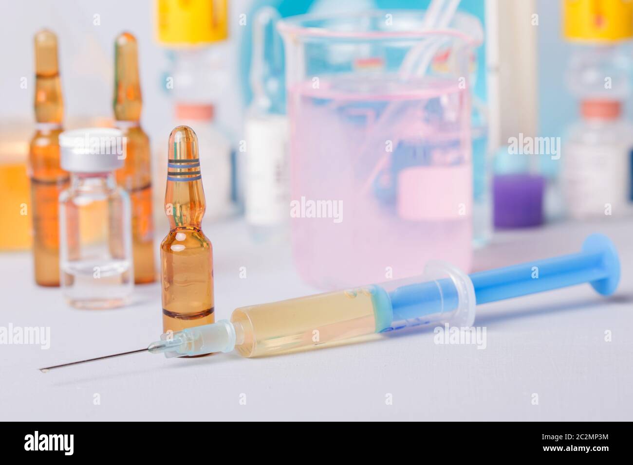 syringe with ampules of drugs Stock Photo - Alamy