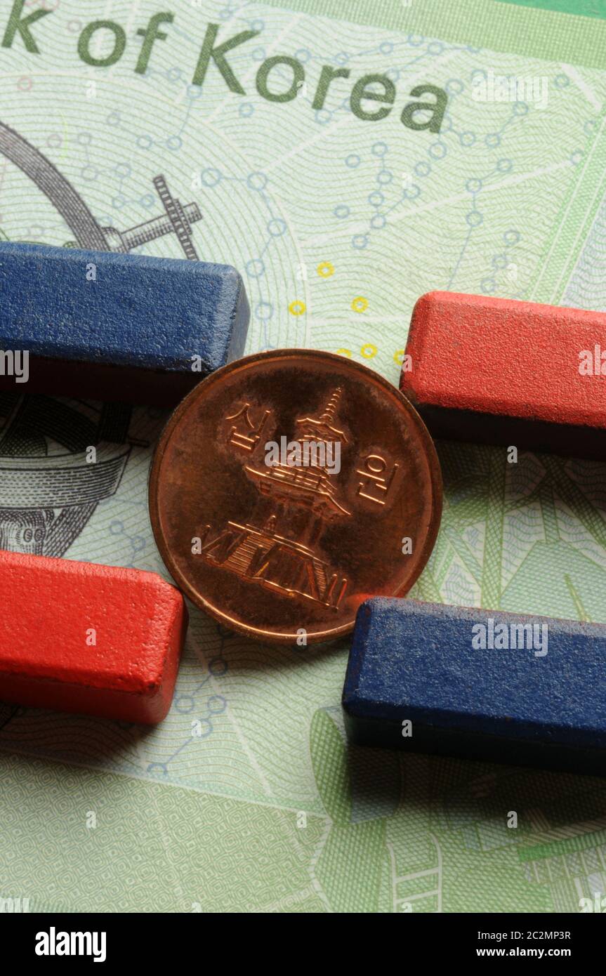 South Korean coin with magnet on banknote Stock Photo - Alamy