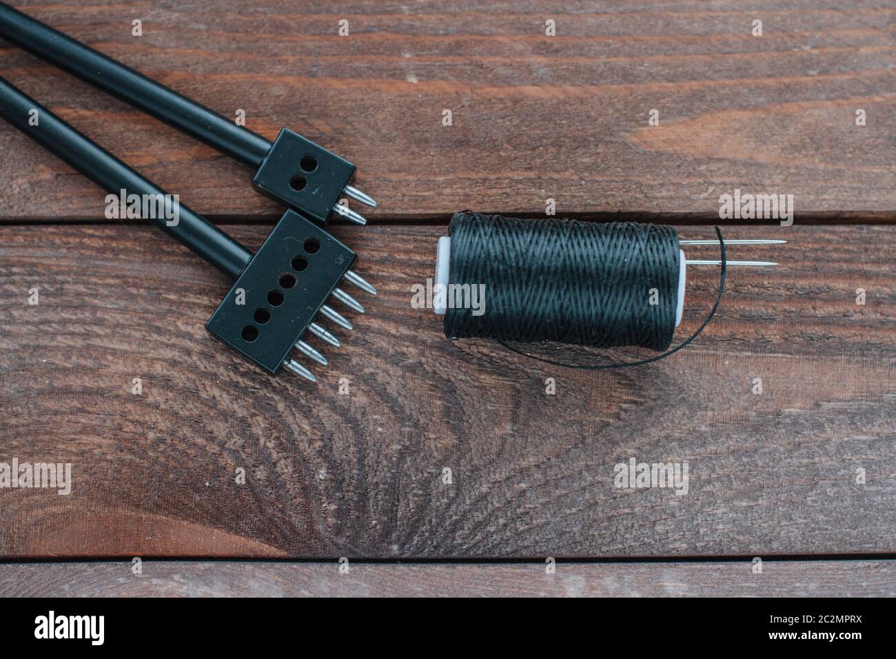 Waxed threads hi-res stock photography and images - Alamy