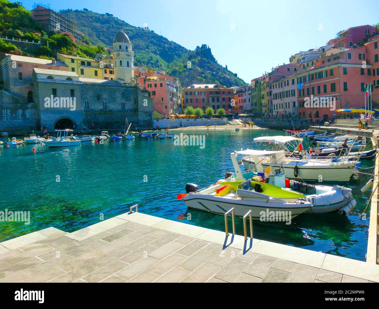 Church and sandy beach in Vernazza town, Cinque Terre National Park ...