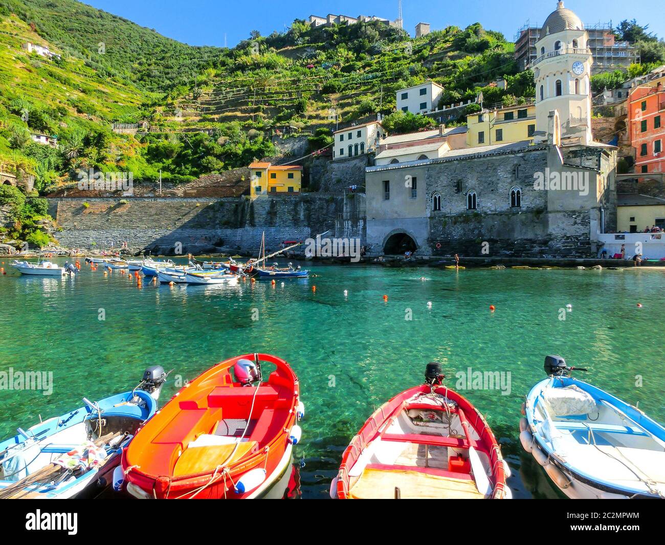 Church and sandy beach in Vernazza town, Cinque Terre National Park ...