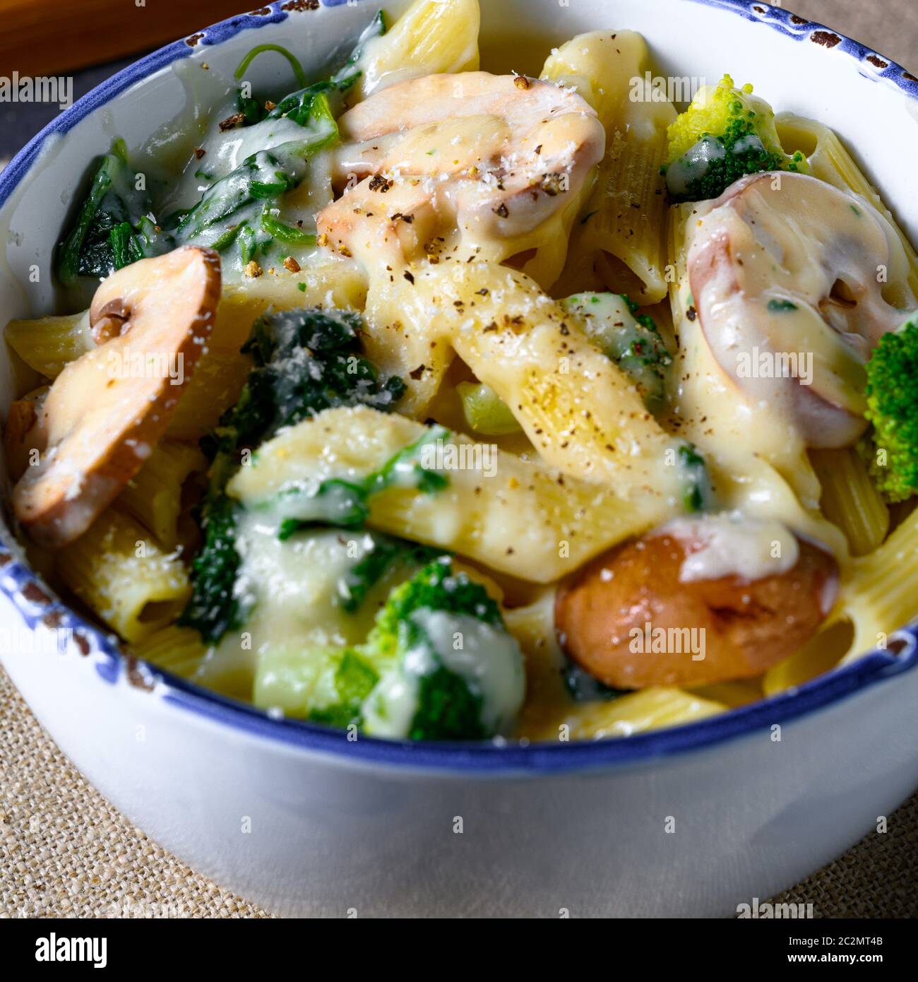 Real pasta with mushrooms, spinach and broccoli Stock Photo - Alamy