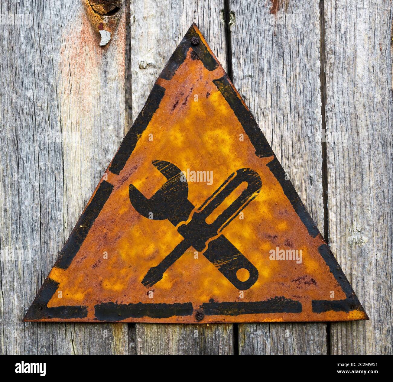 Icon of Crossed Screwdriver and Wrench on Weathered Triangular Yellow ...