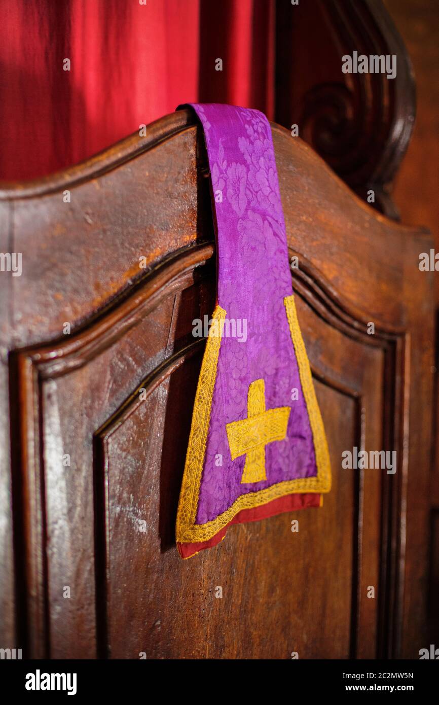 typical stole decorated with a gold cross used by the priest during the ...