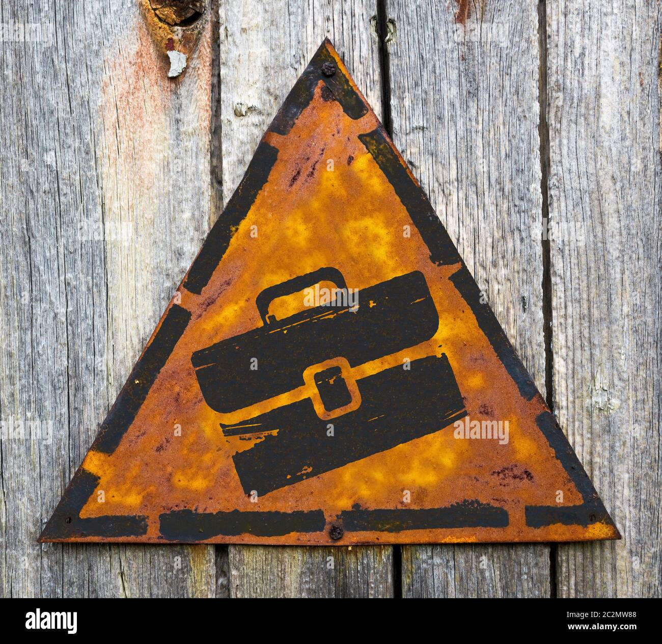 Briefcase Icon on Weathered Triangular Yellow Warning Sign. Grange ... Briefcase Icon on Weathered Triangular Yellow Warning Sign. Grange ...