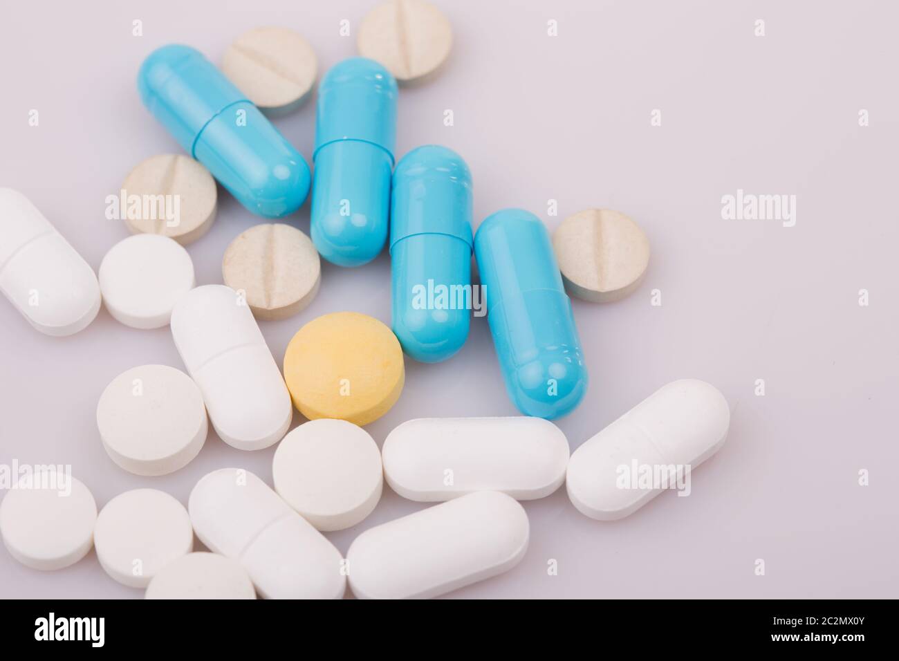 different Tablets pills capsule heap mix therapy drugs Stock Photo - Alamy