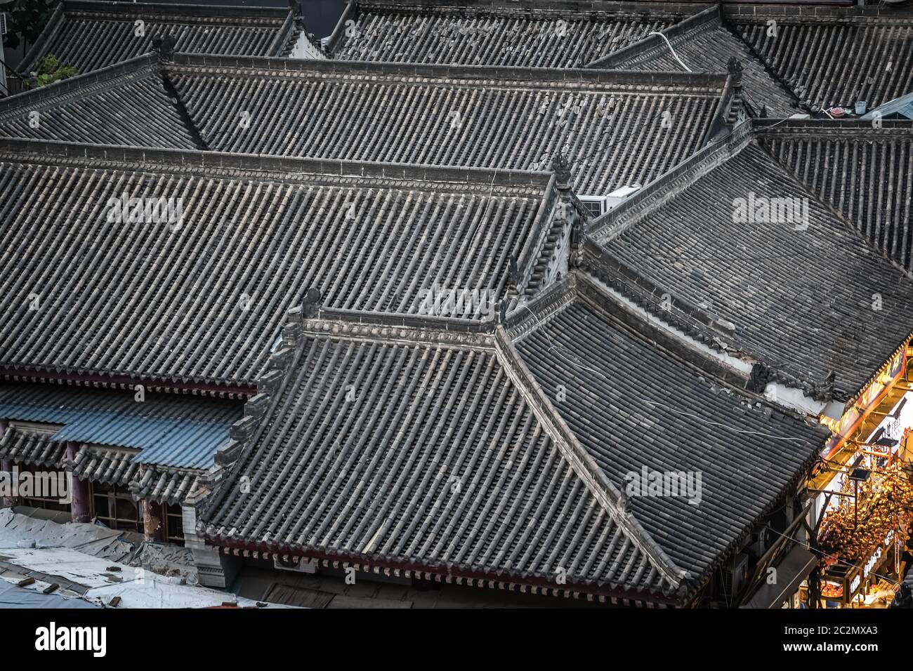 Traditional rooftops of old buildings in the centre of Xian city ...