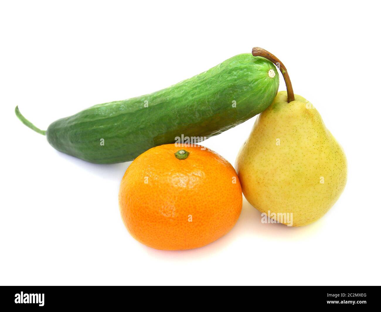 cucumber with a tangerine and a pear Stock Photo - Alamy