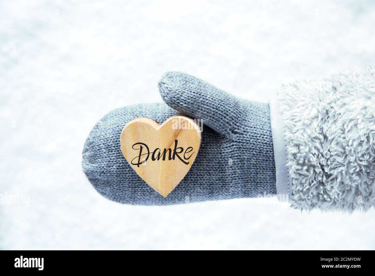 Heart With German Calligraphy Danke Means Thank You. Hand In A Glove ...