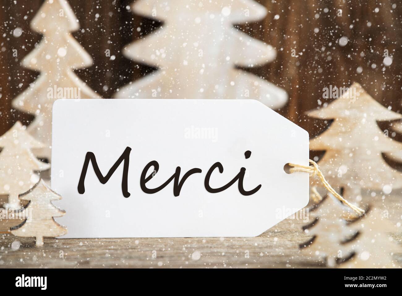 Label With French Text Merci Means Thank You. White Wooden Christmas ...